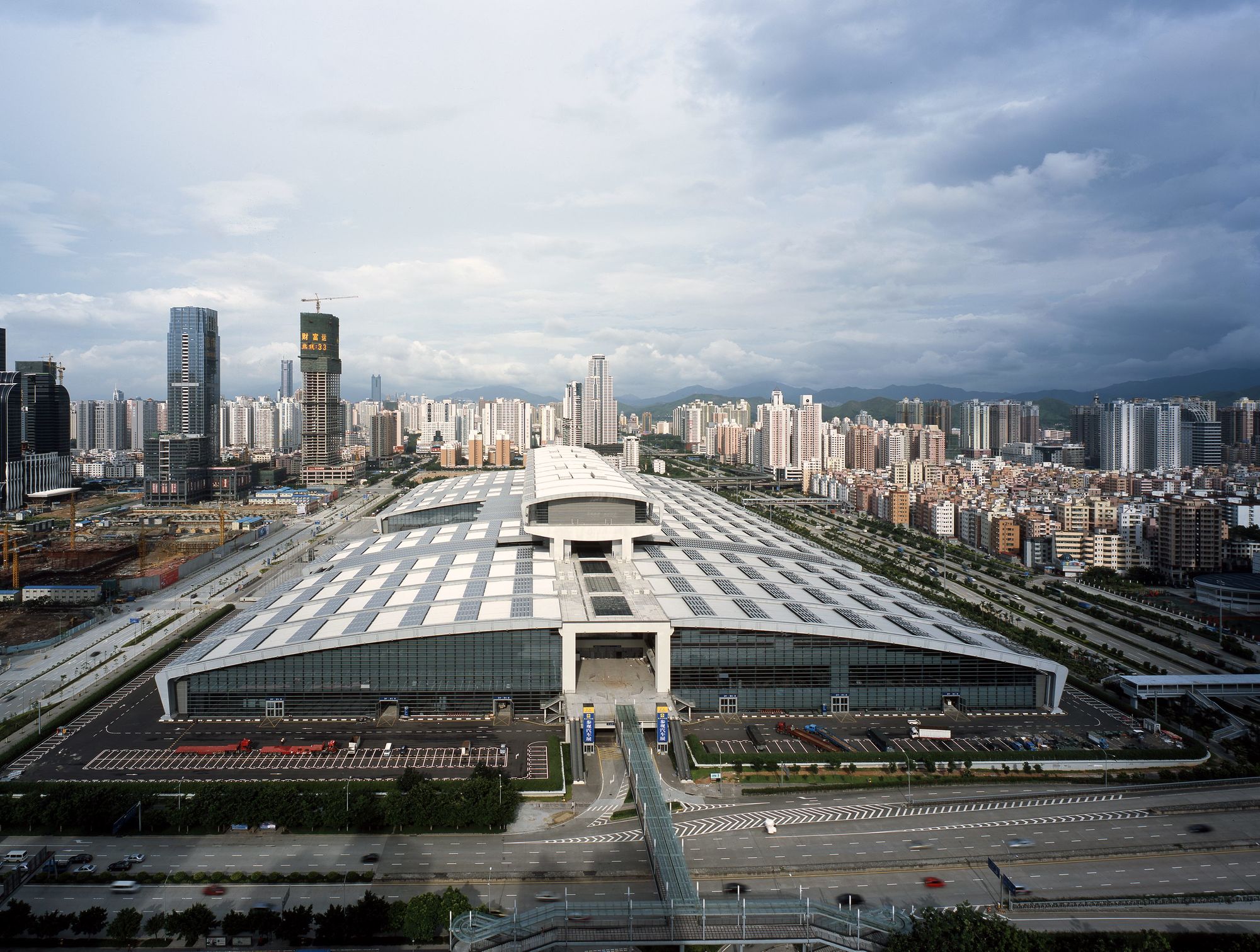 Shenzhen Convention & Exhibition Center - Projects - gmp Architekten